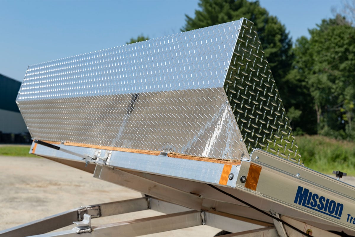 Open Tilting Drive-On/Drive-Off Snow Trailers by Mission Trailers